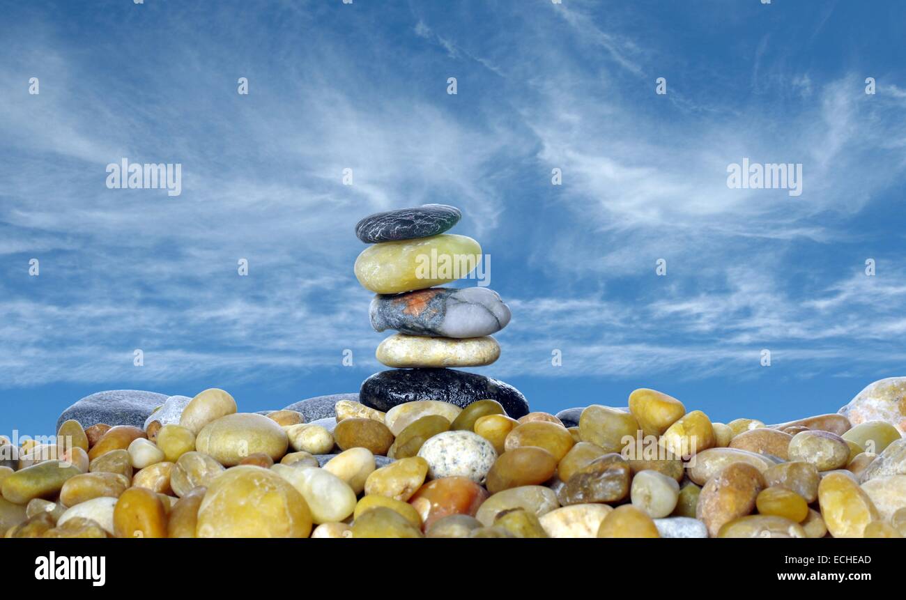 pyramid with five stones on a sky background Stock Photo - Alamy