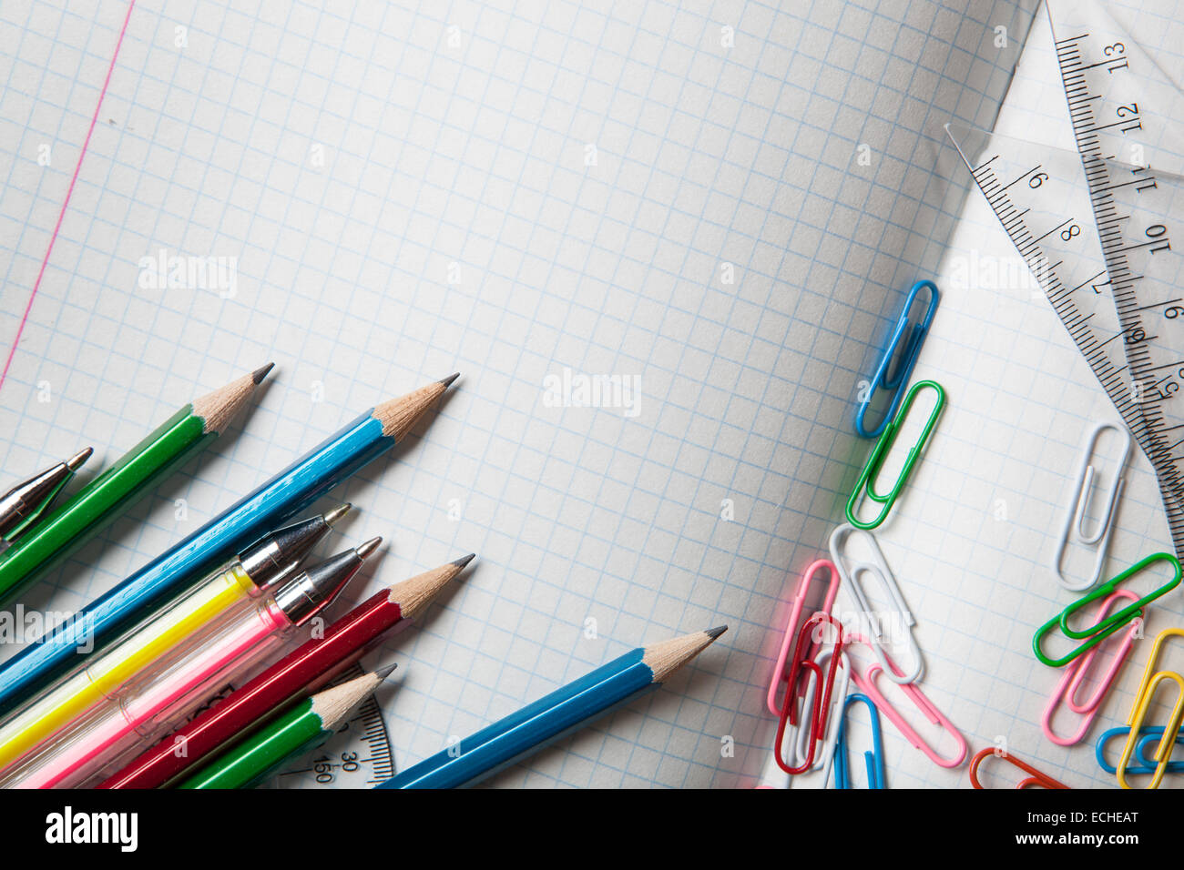 notebook with pencils and clips Stock Photo - Alamy