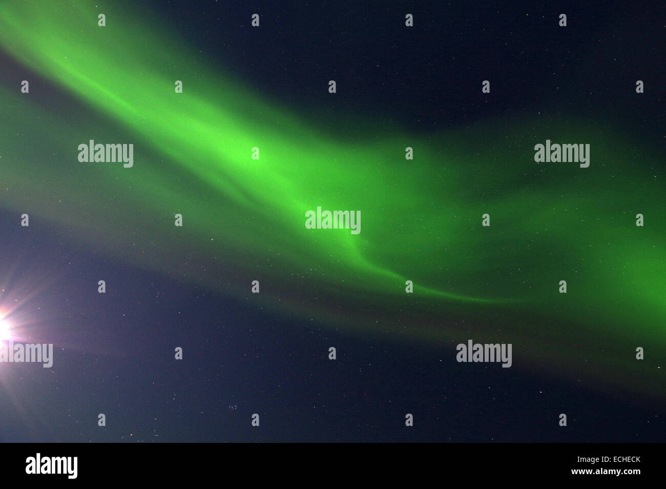 Northern Lights by full moon over southern Iceland Stock Photo - Alamy
