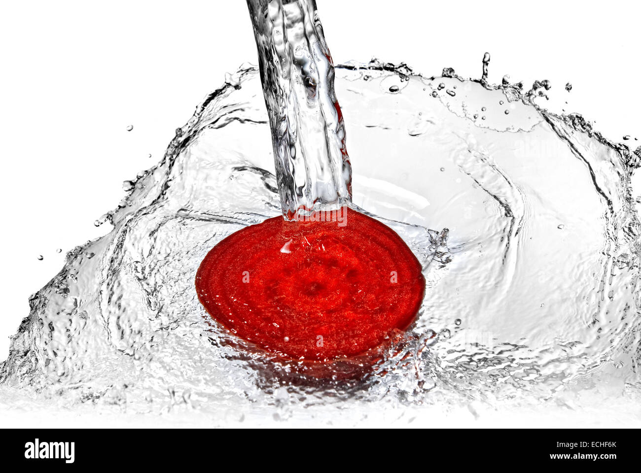 red beet with water splash isolated on white Stock Photo - Alamy