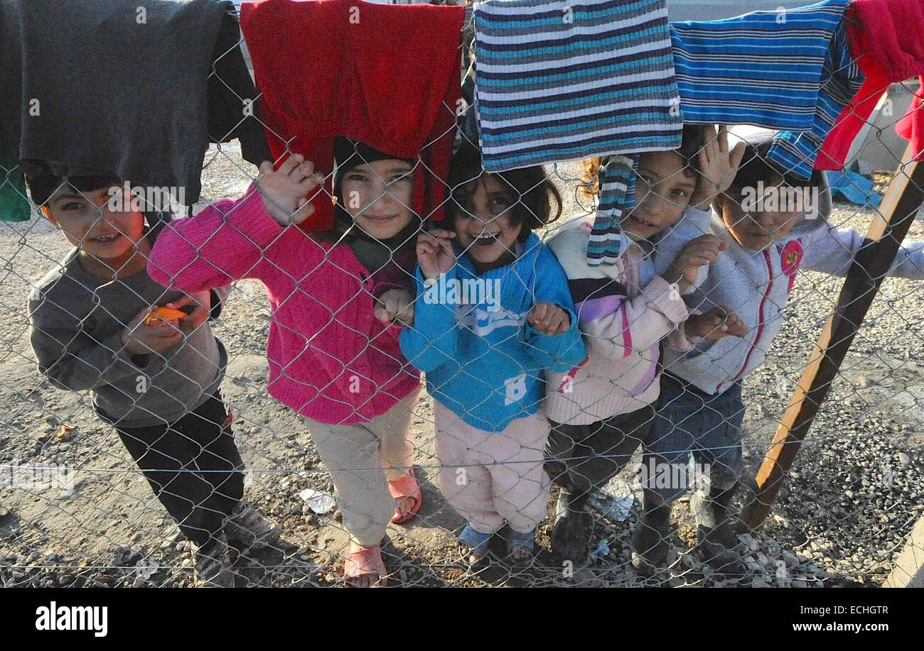 Suruc, Turkey. 15th Dec, 2014. Syrian Kurdish refugees face a difficult ...