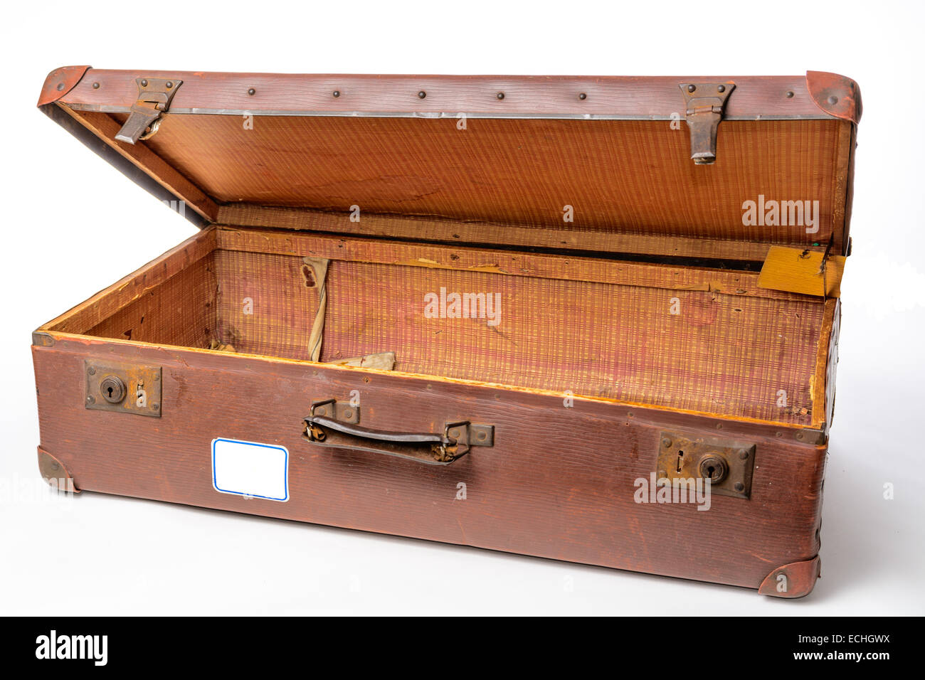 Open vintage suitcase with label on white background Stock Photo - Alamy
