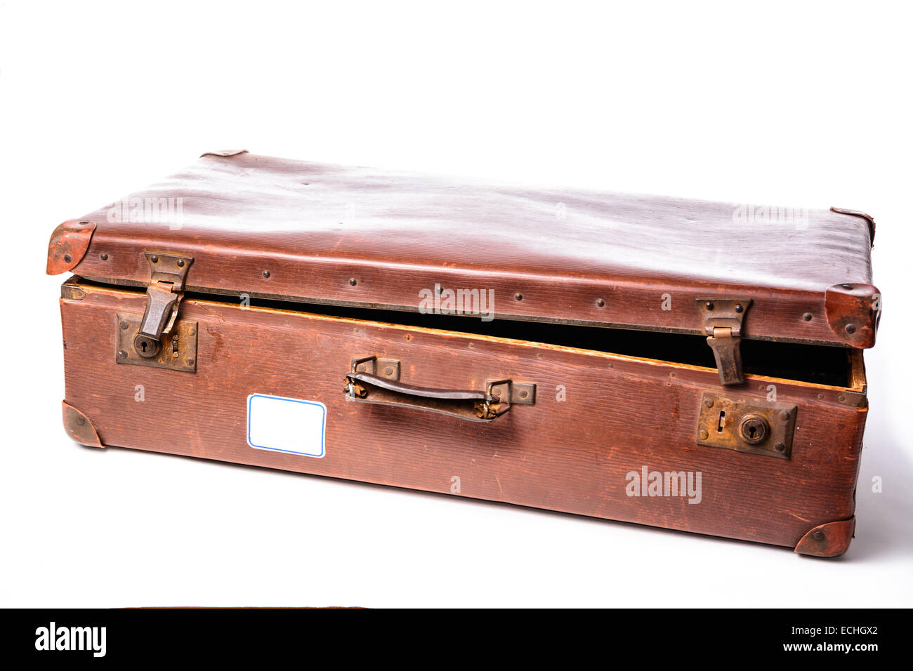 Vintage suitcase with label on white background Stock Photo - Alamy