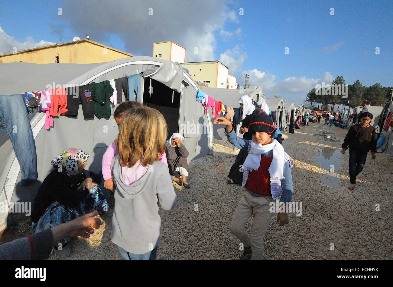 Suruc, Turkey. 15th Dec, 2014. Syrian Kurdish refugees face a difficult ...