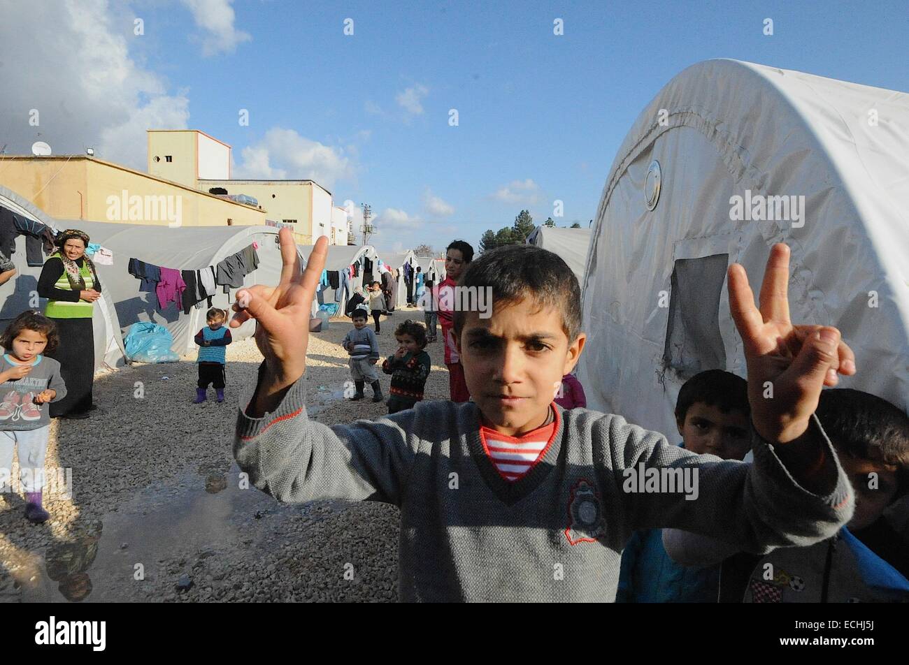 Suruc, Turkey. 15th Dec, 2014. Syrian Kurdish refugees face a difficult ...