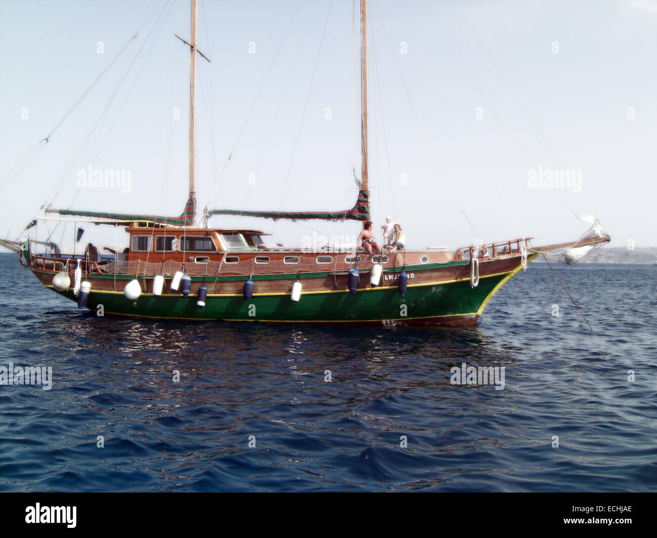 Sailboat in the sea without wind Stock Photo - Alamy