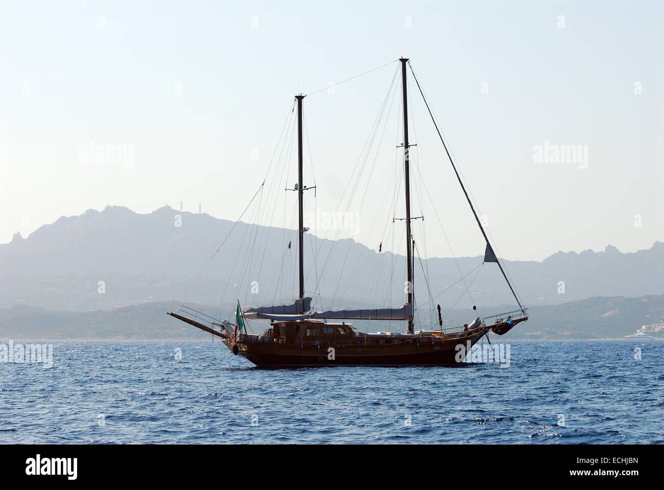 Sailboat in the sea without wind Stock Photo - Alamy