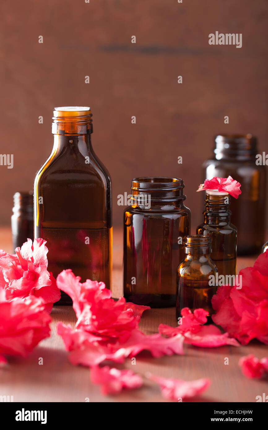 essential oil azalea flowers on dark rustic background Stock Photo - Alamy