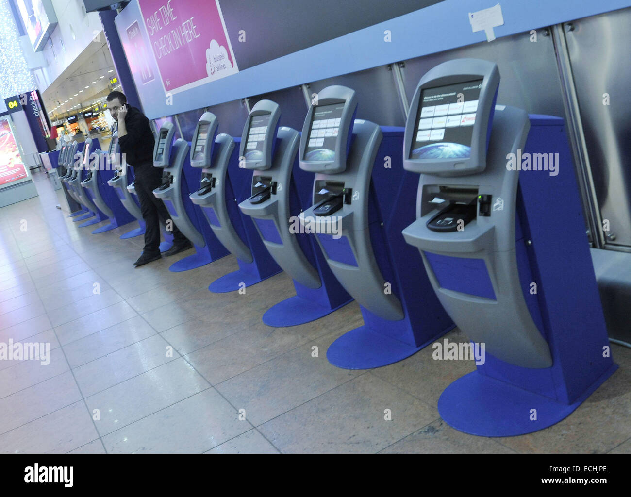 Brussels, Belgium. 15th Dec, 2014. A man makes a phone call next to ...
