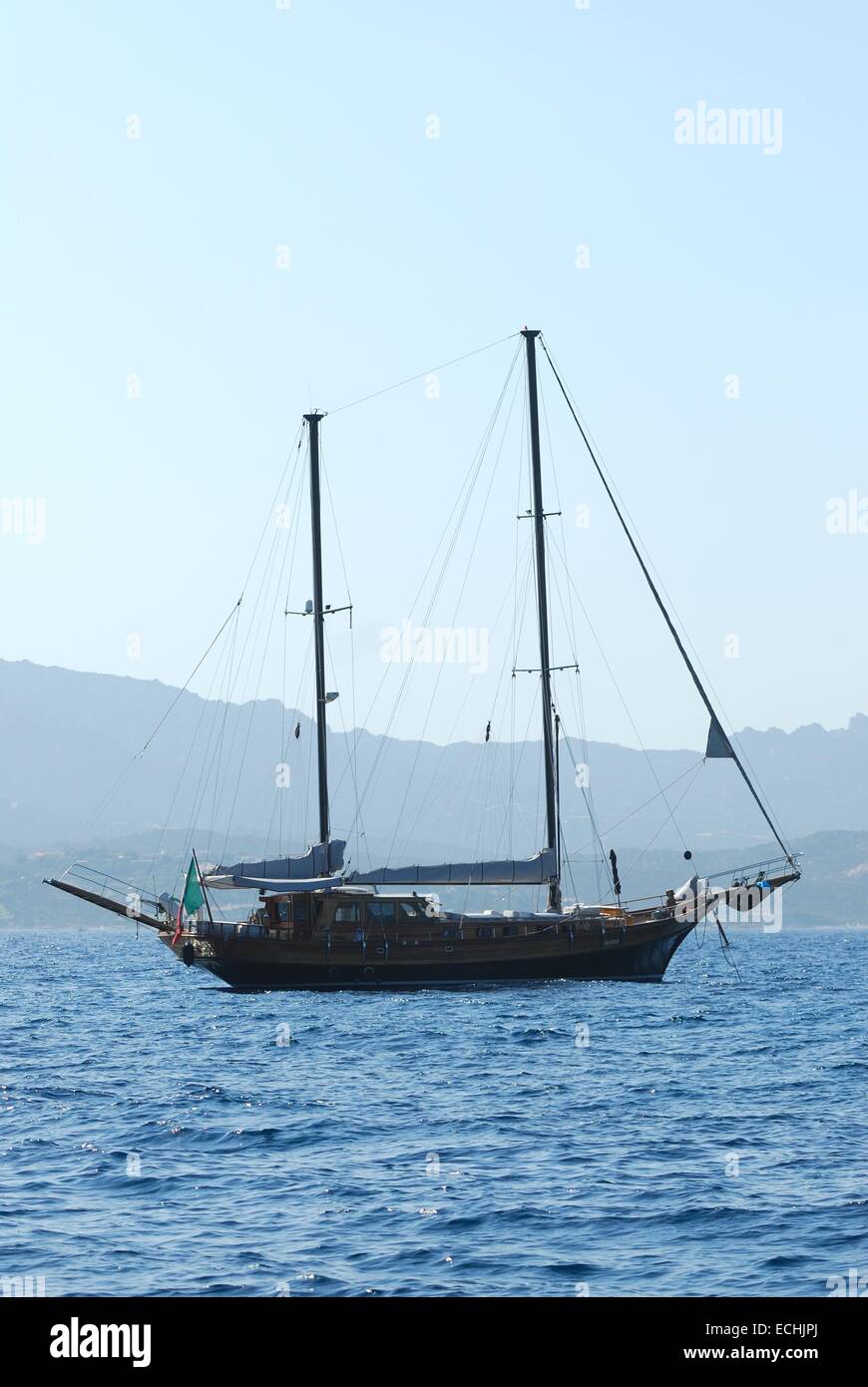 Sailboat in the sea without wind Stock Photo - Alamy