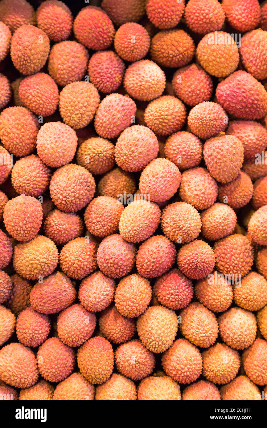 Many lychees at a market stall Stock Photo - Alamy