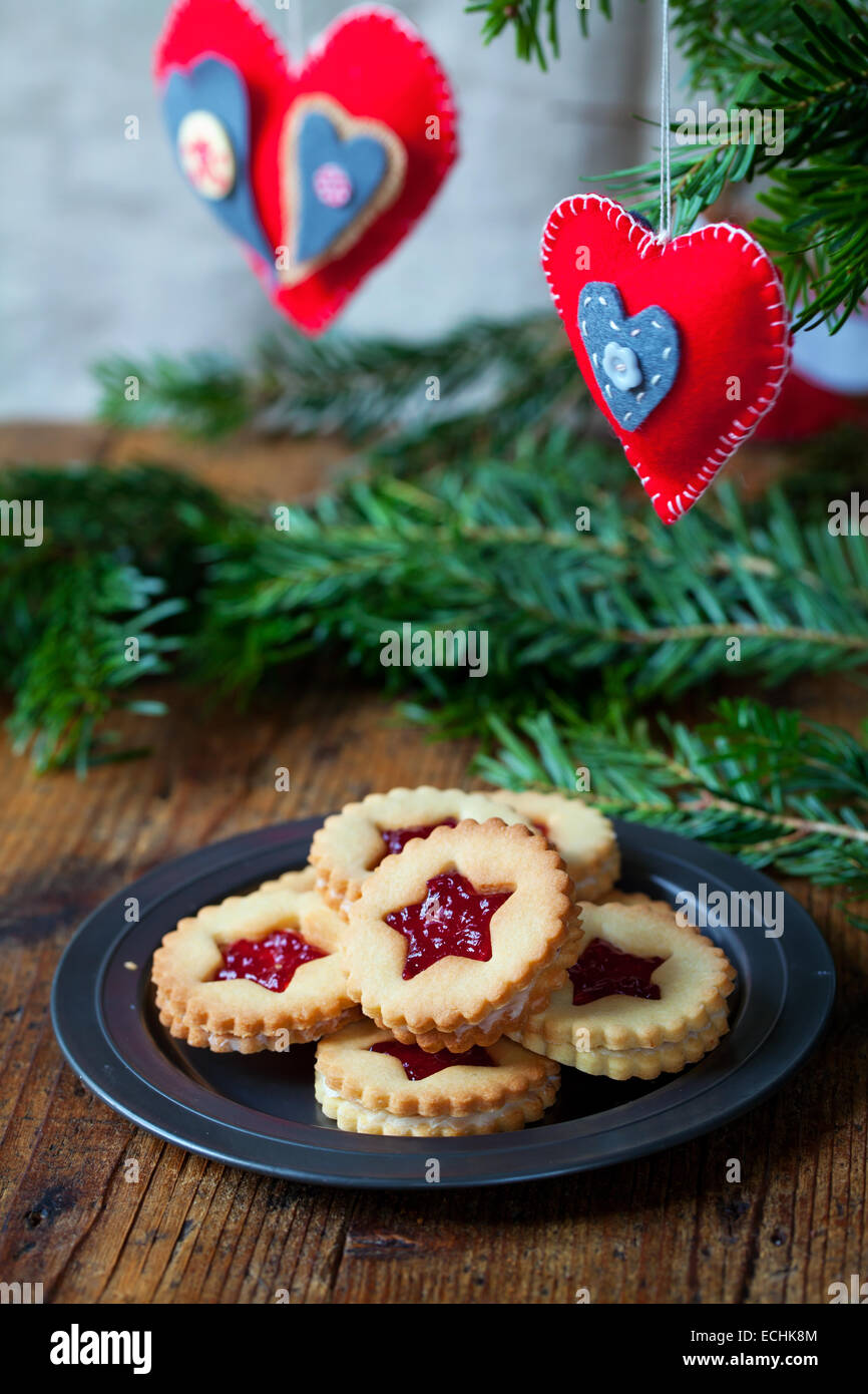 Jam filled biscuits in Christmas setting Stock Photo - Alamy