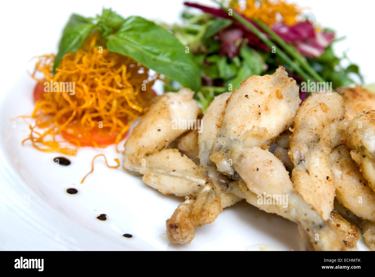 fried frogs legs Stock Photo - Alamy