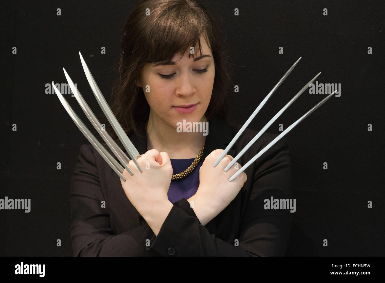 Wolverine claws hi-res stock photography and images - Alamy
