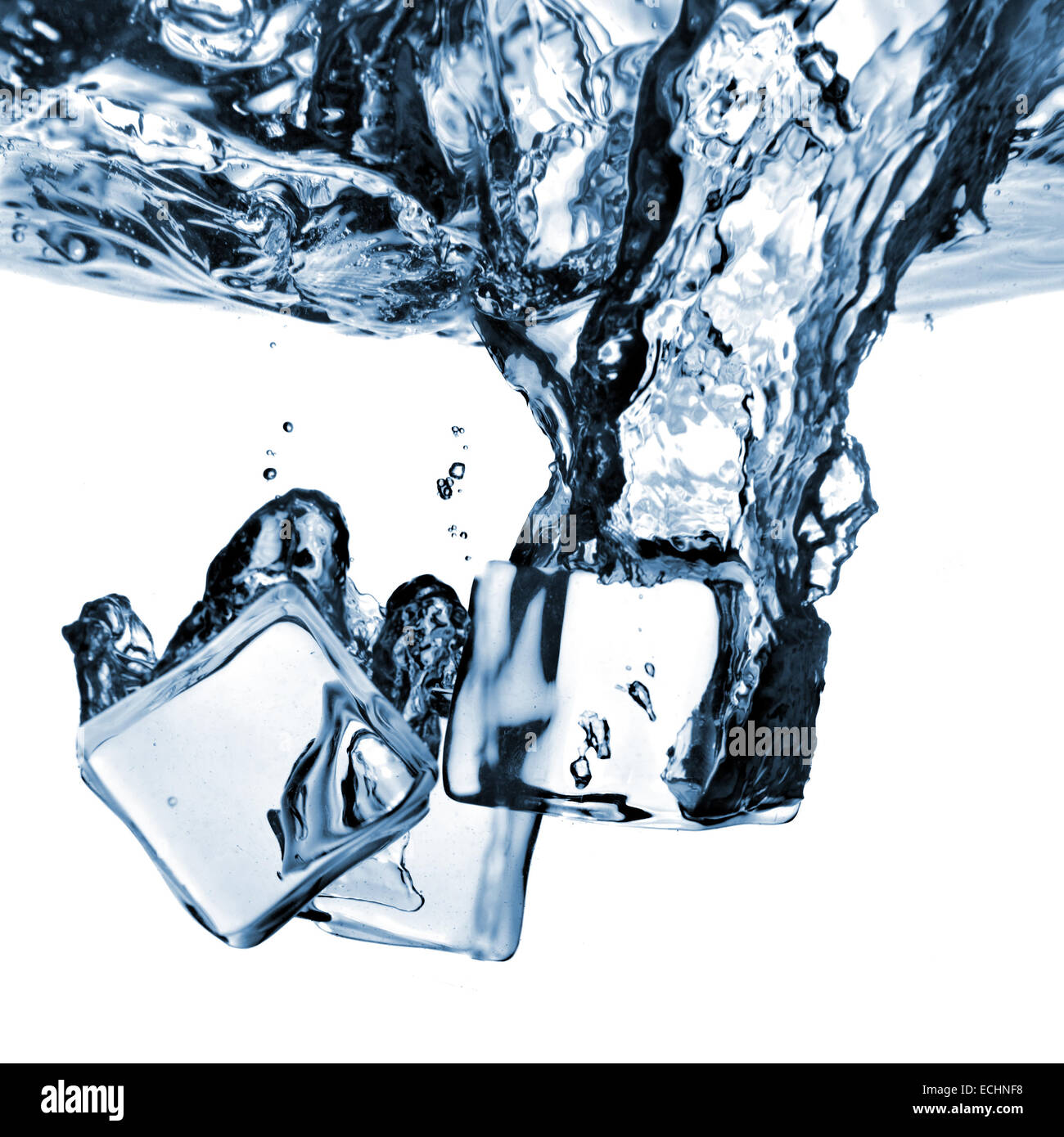 ice cubes dropped into water with splash isolated on white Stock Photo - Alamy