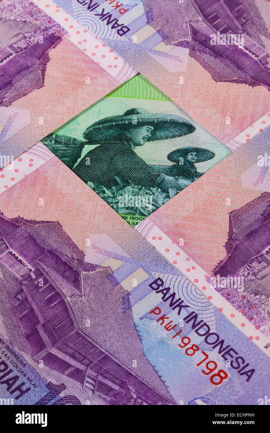 Different Indonesian rupiah banknotes on the table Stock Photo - Alamy