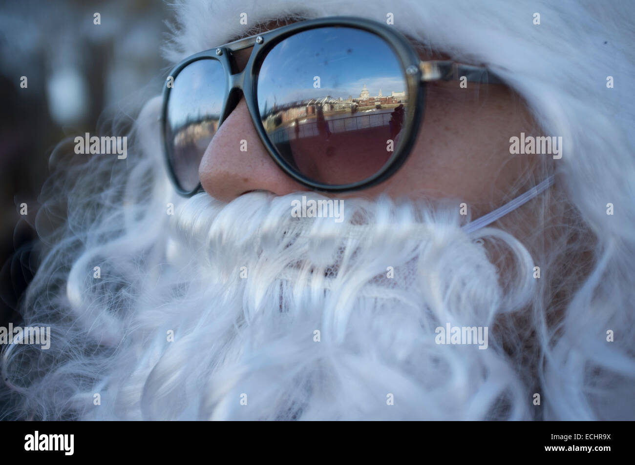 Santa Claus wearing sunglasses Stock Photo - Alamy