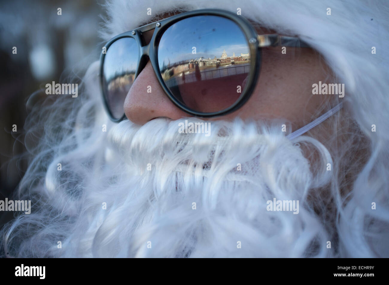 Santa Claus wearing sunglasses Stock Photo - Alamy