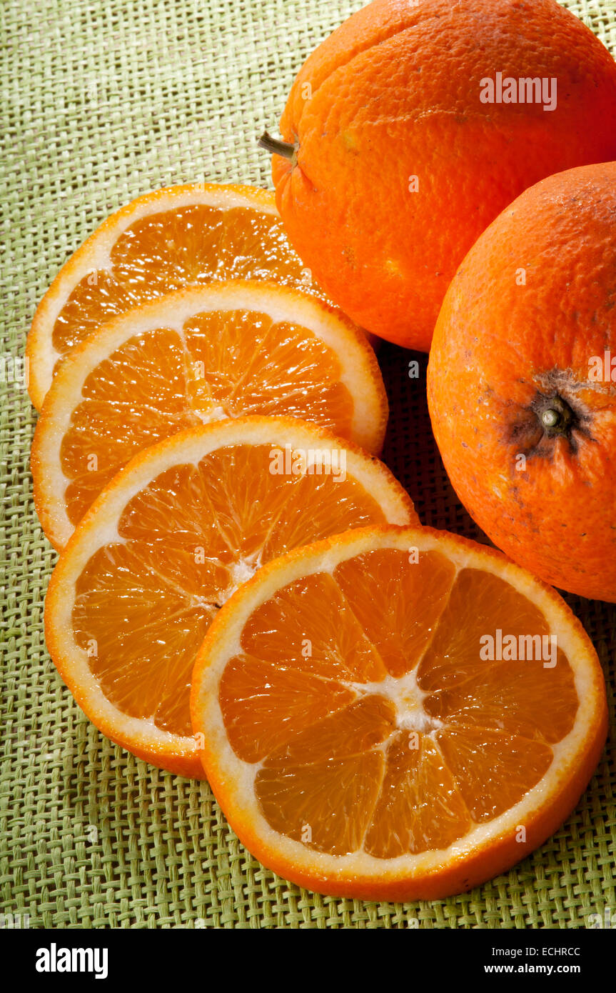 orange slices fresh-cut ready to decorate the food Stock Photo - Alamy