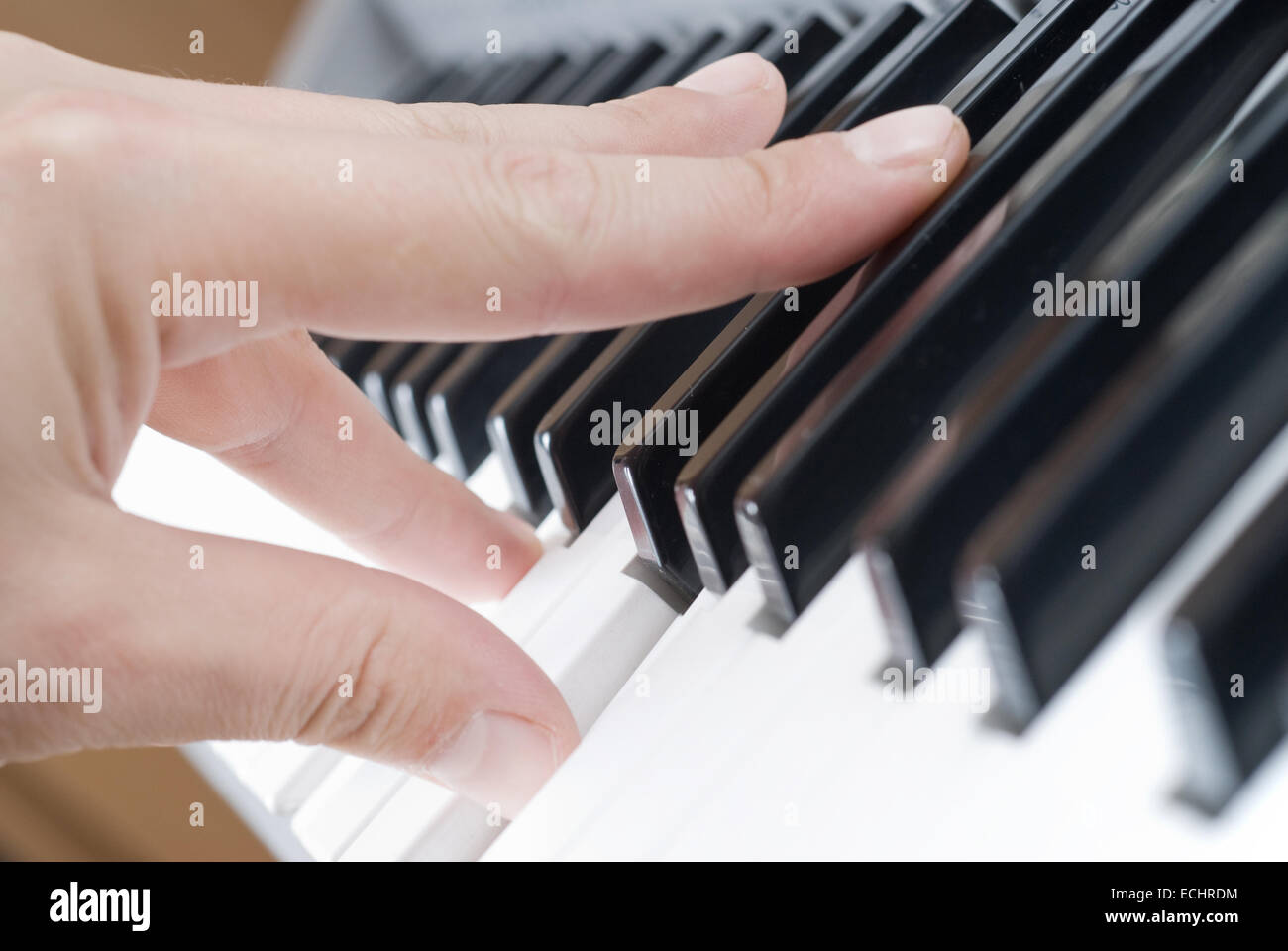 hand playing music on the piano Stock Photo - Alamy