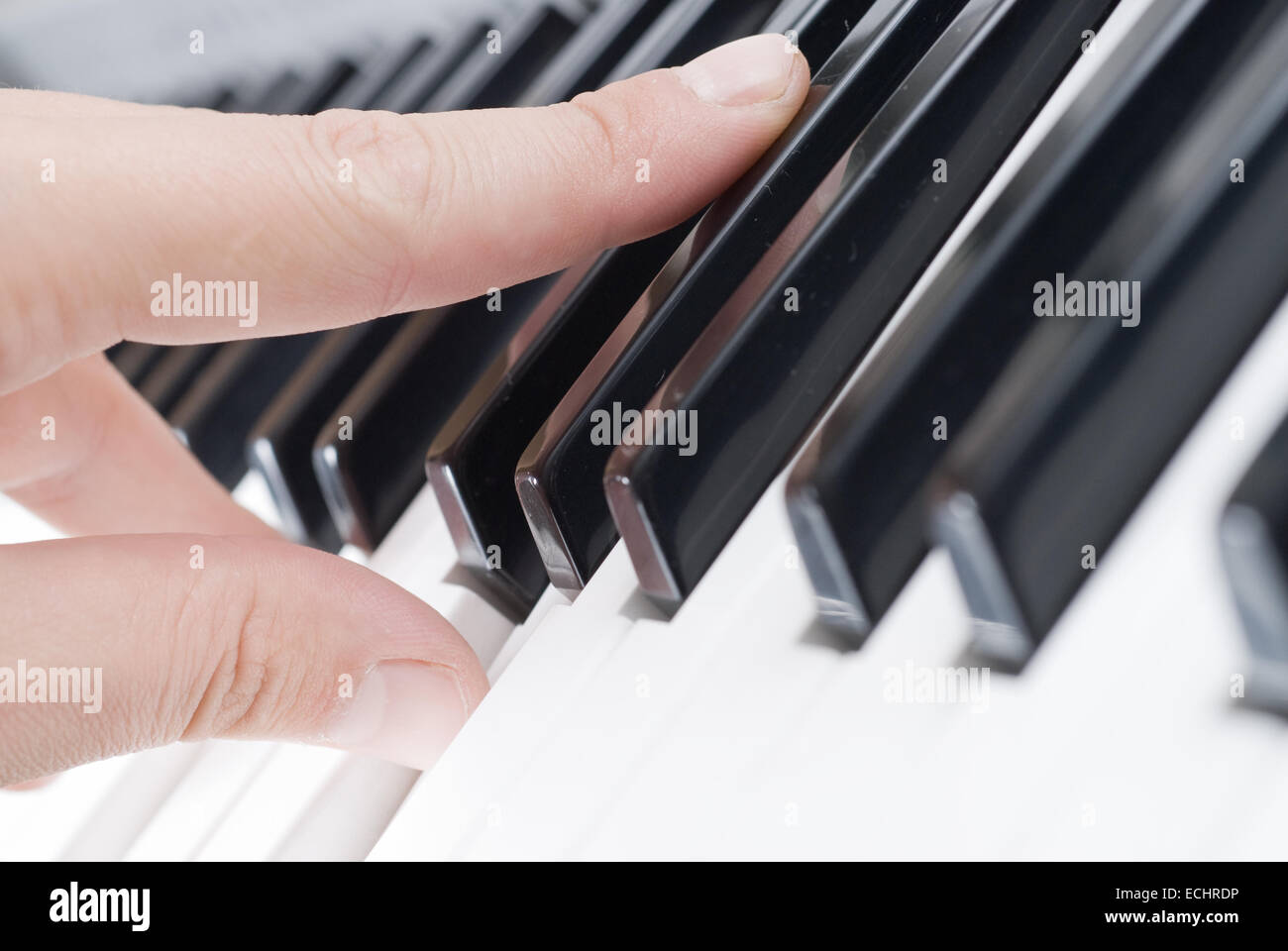 hand playing music on the piano Stock Photo - Alamy