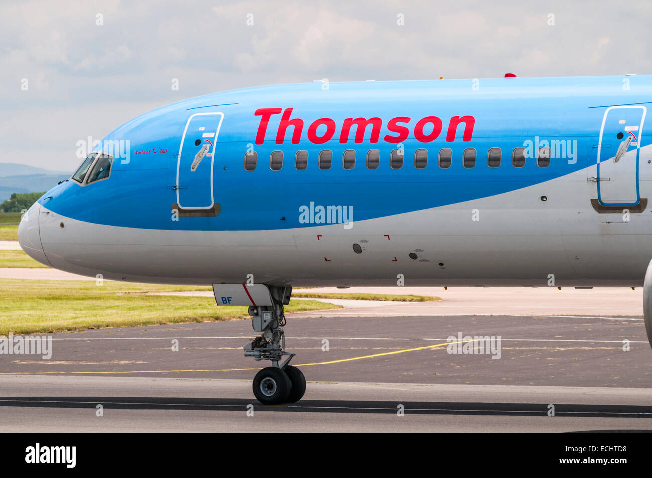 Side view of the front of a Thomson Boeing 757 aeroplane at Manchester ...
