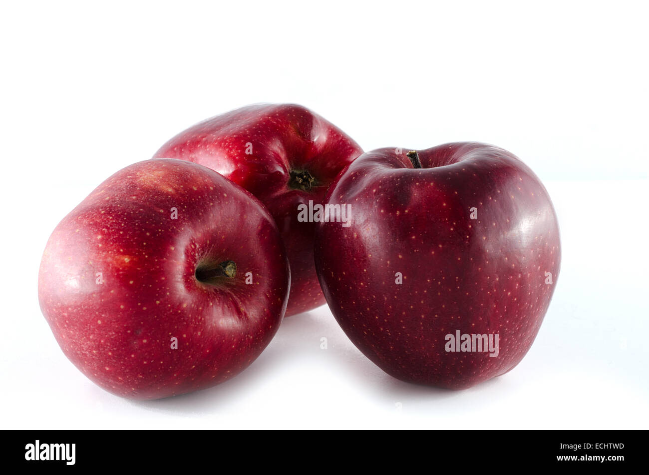 red stark apples isolated on white background Stock Photo - Alamy