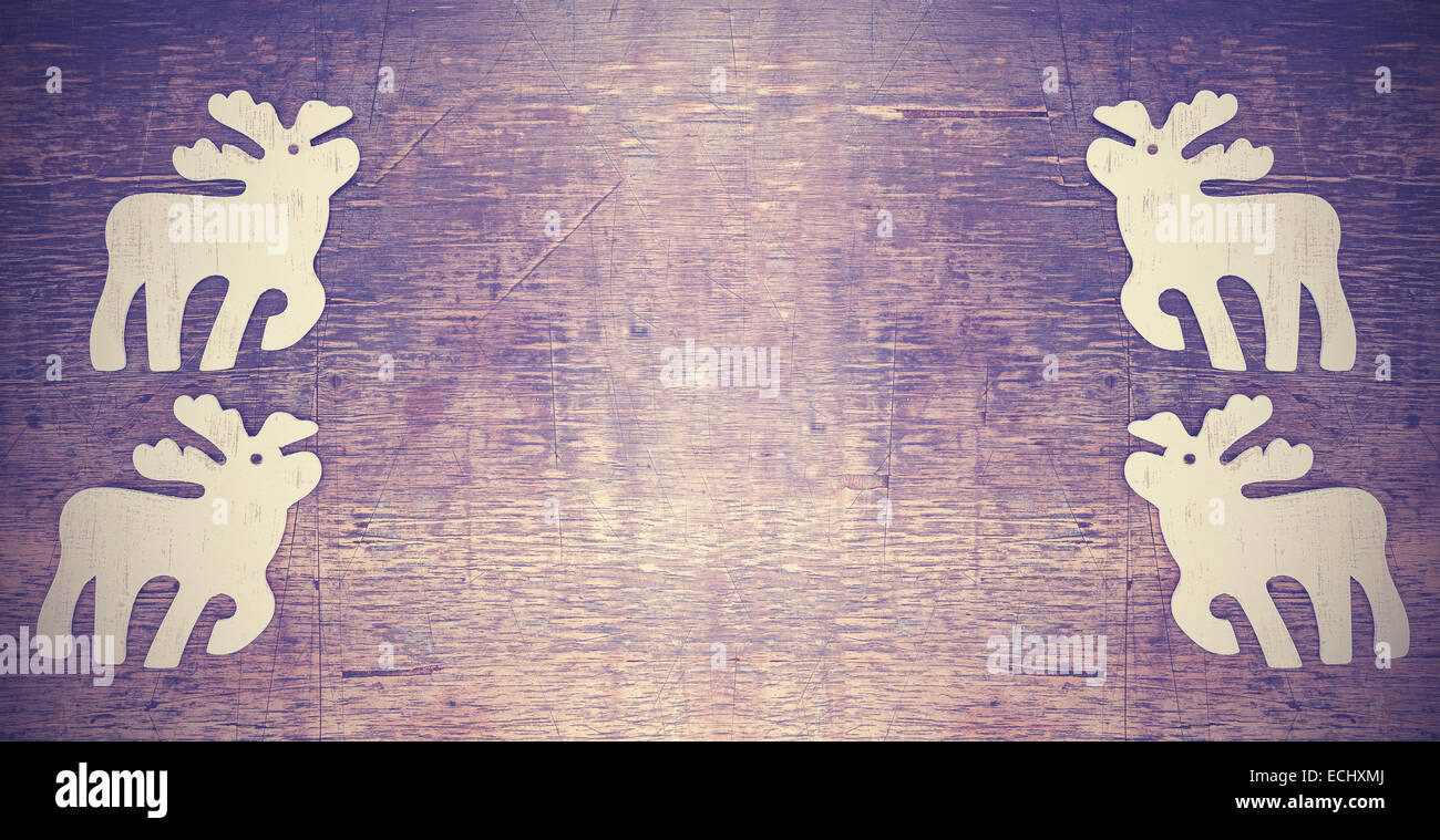 Vintage background, Christmas moose on wooden background Stock Photo ...