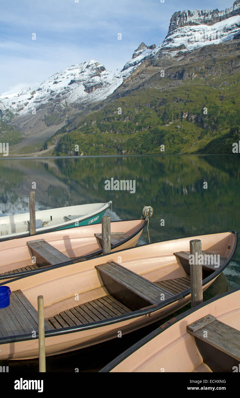 Boats on Engstlensee, a high Alpine lake below Jochpass and Titlis ...