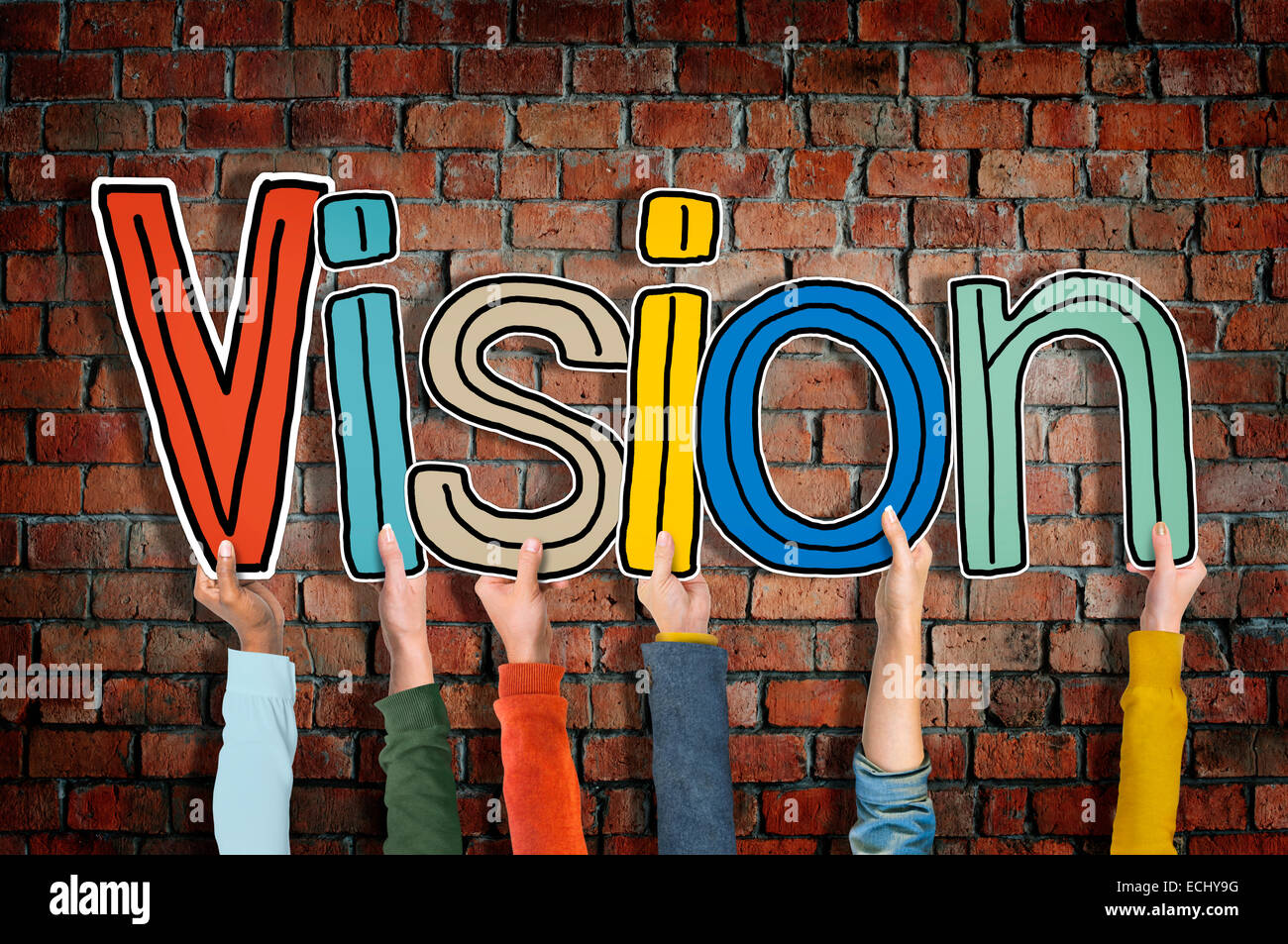 Group of Hands Holding Letter Vision Stock Photo - Alamy