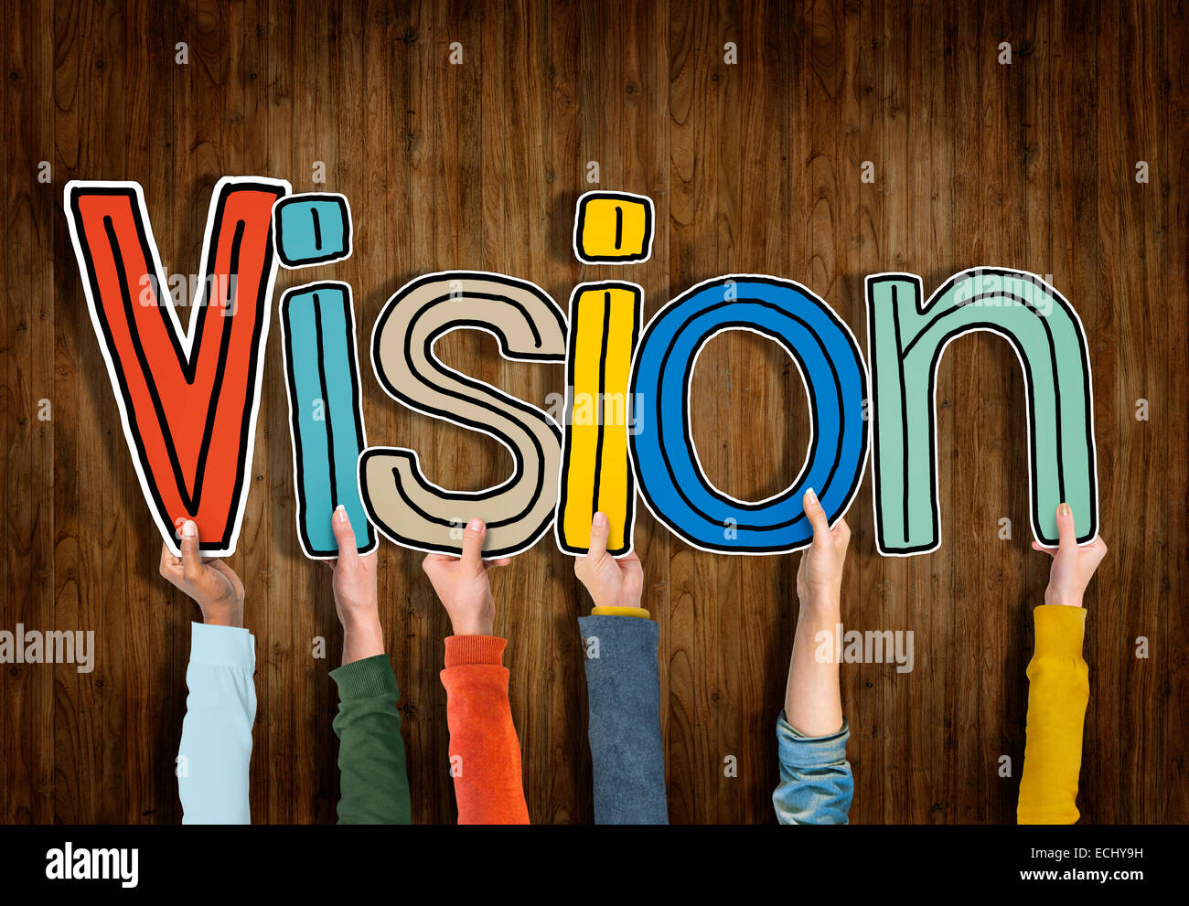 Group of Hands Holding Letter Vision Stock Photo - Alamy