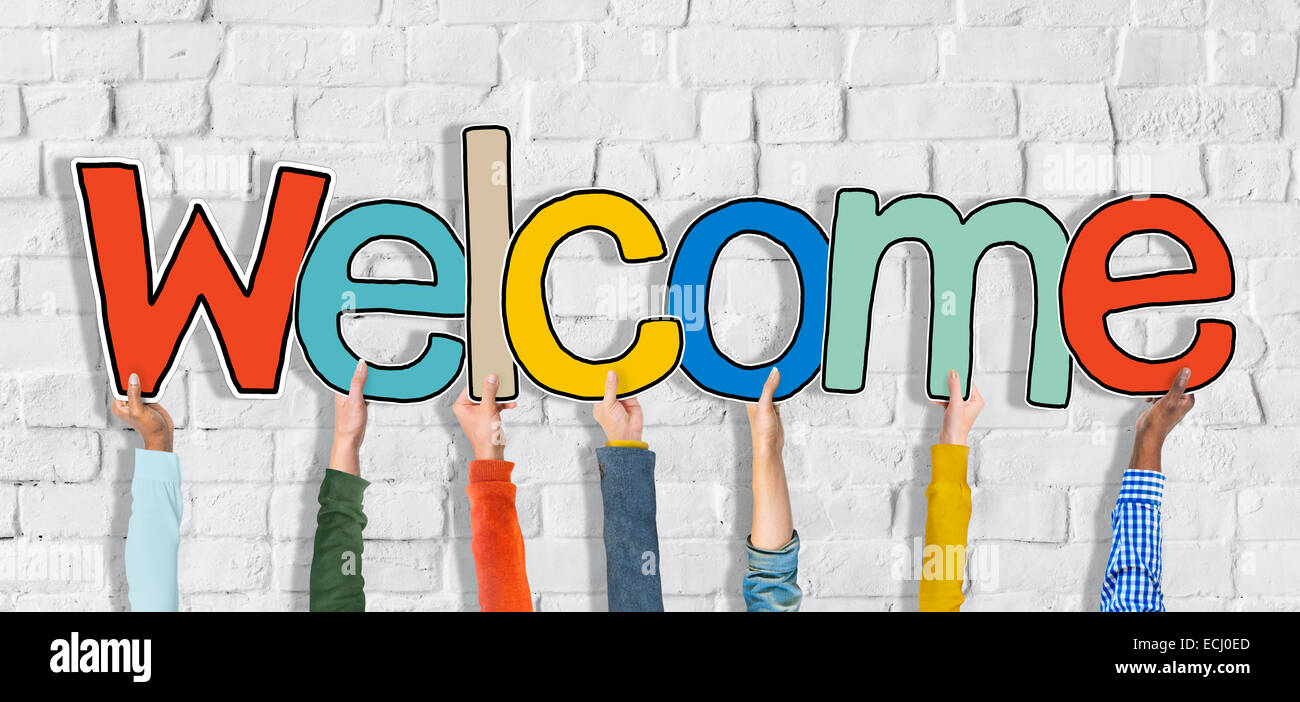 Group of Hands Holding Word Welcome Stock Photo - Alamy
