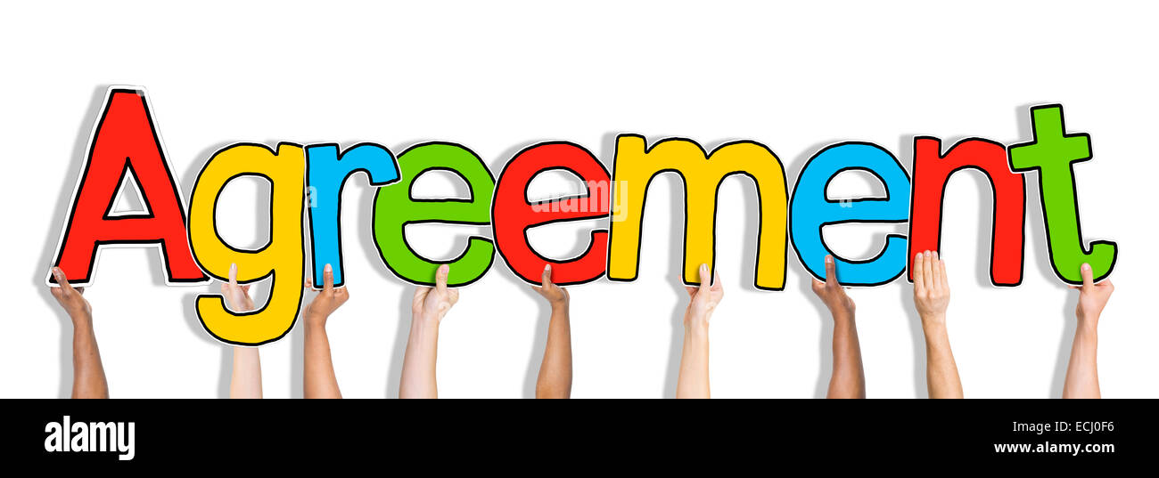 Group of Hands Holding Word Agreement Stock Photo - Alamy