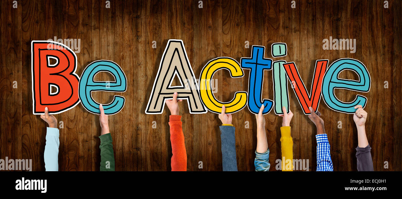 Group of Hands Holding Word Be Active Stock Photo - Alamy