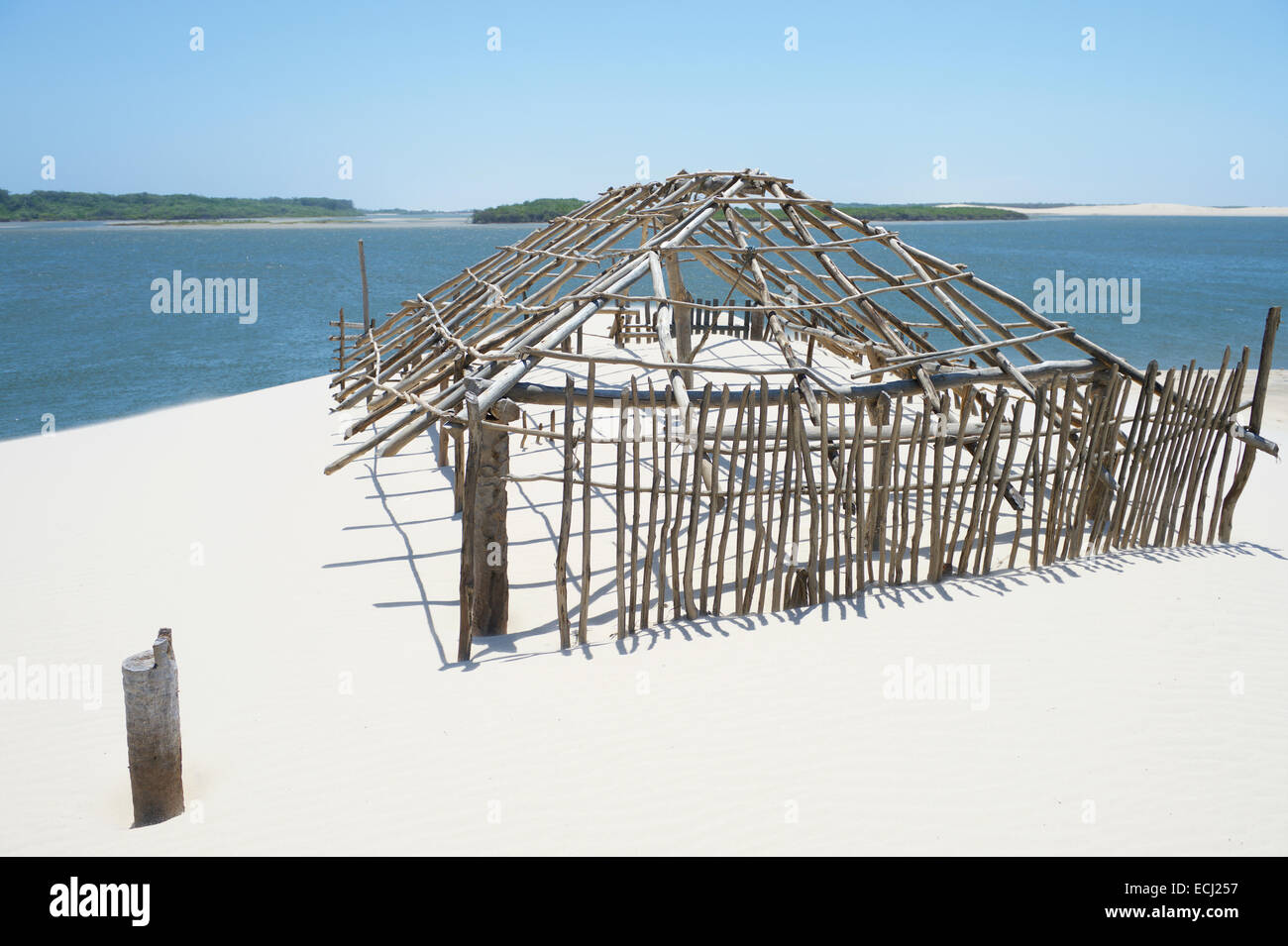 Frame of a Brazilian beach shack taken over by shifting sand dunes in ...