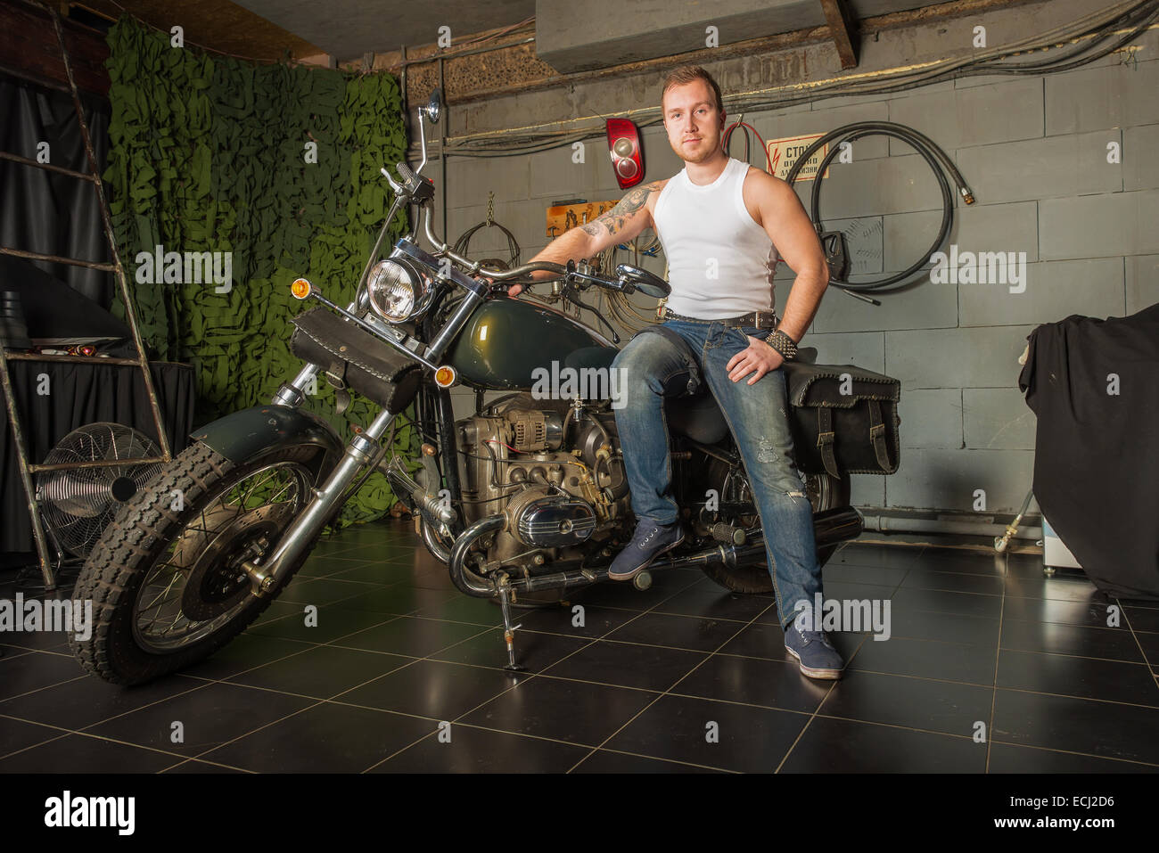 Portrait man leaning on motorcycle hi-res stock photography and images ...