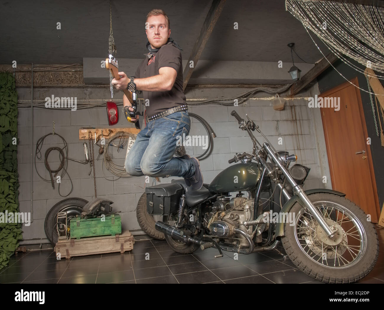 Man motorbike guitar hi-res stock photography and images - Alamy