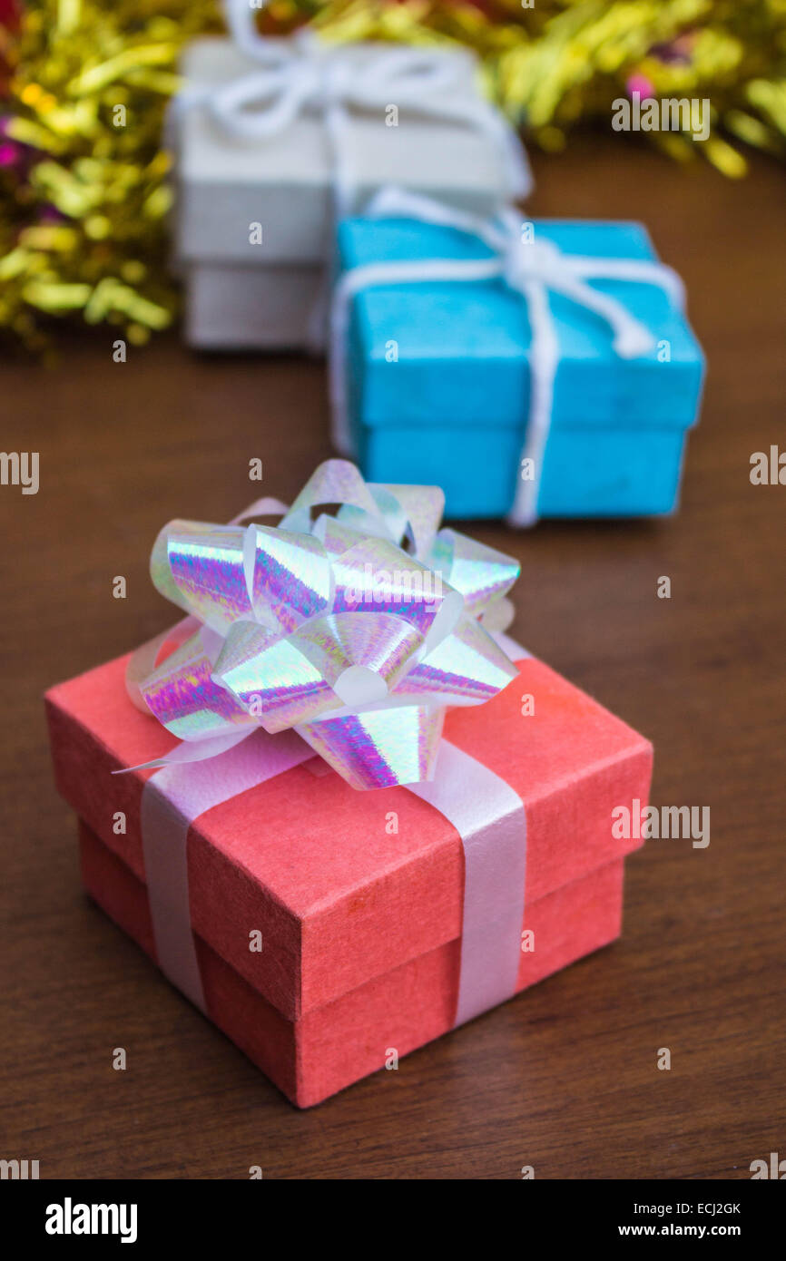 Colorful gift boxes arranged on a table Stock Photo - Alamy