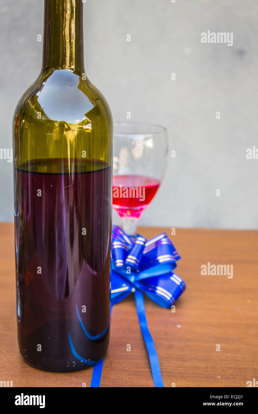 Wine bottles stacked of ribbons Stock Photo - Alamy