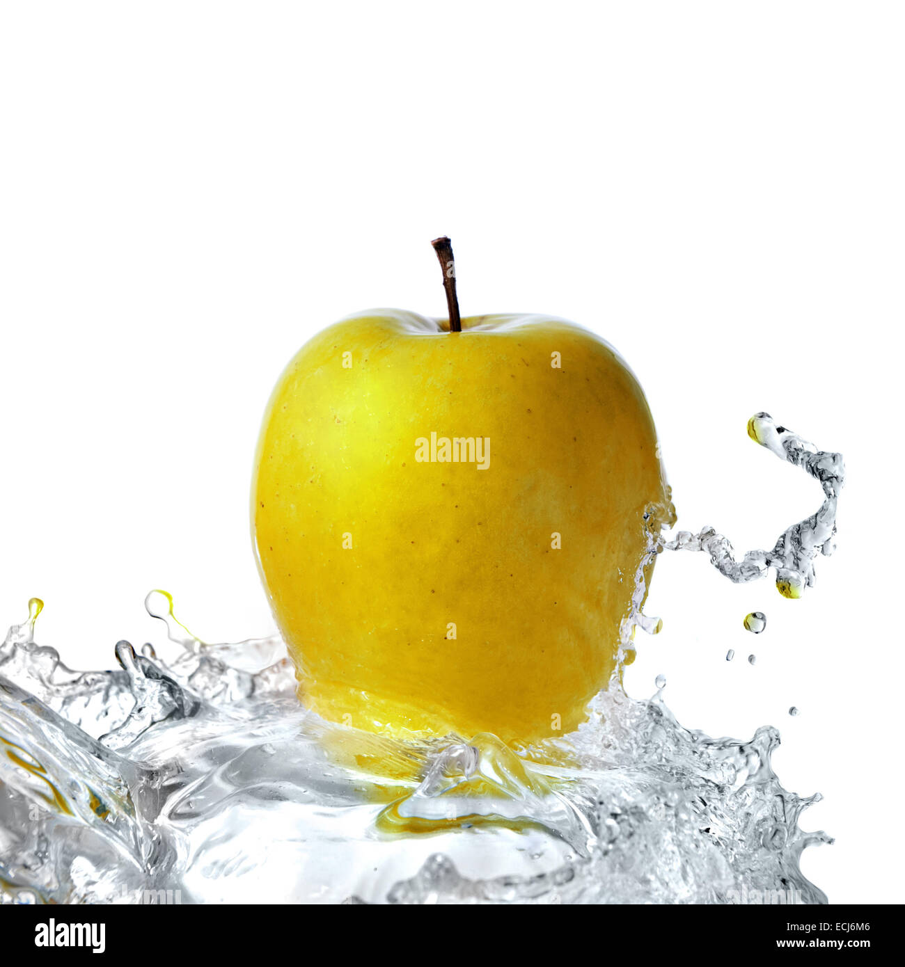 fresh water splash on yellow apple isolated on white Stock Photo - Alamy