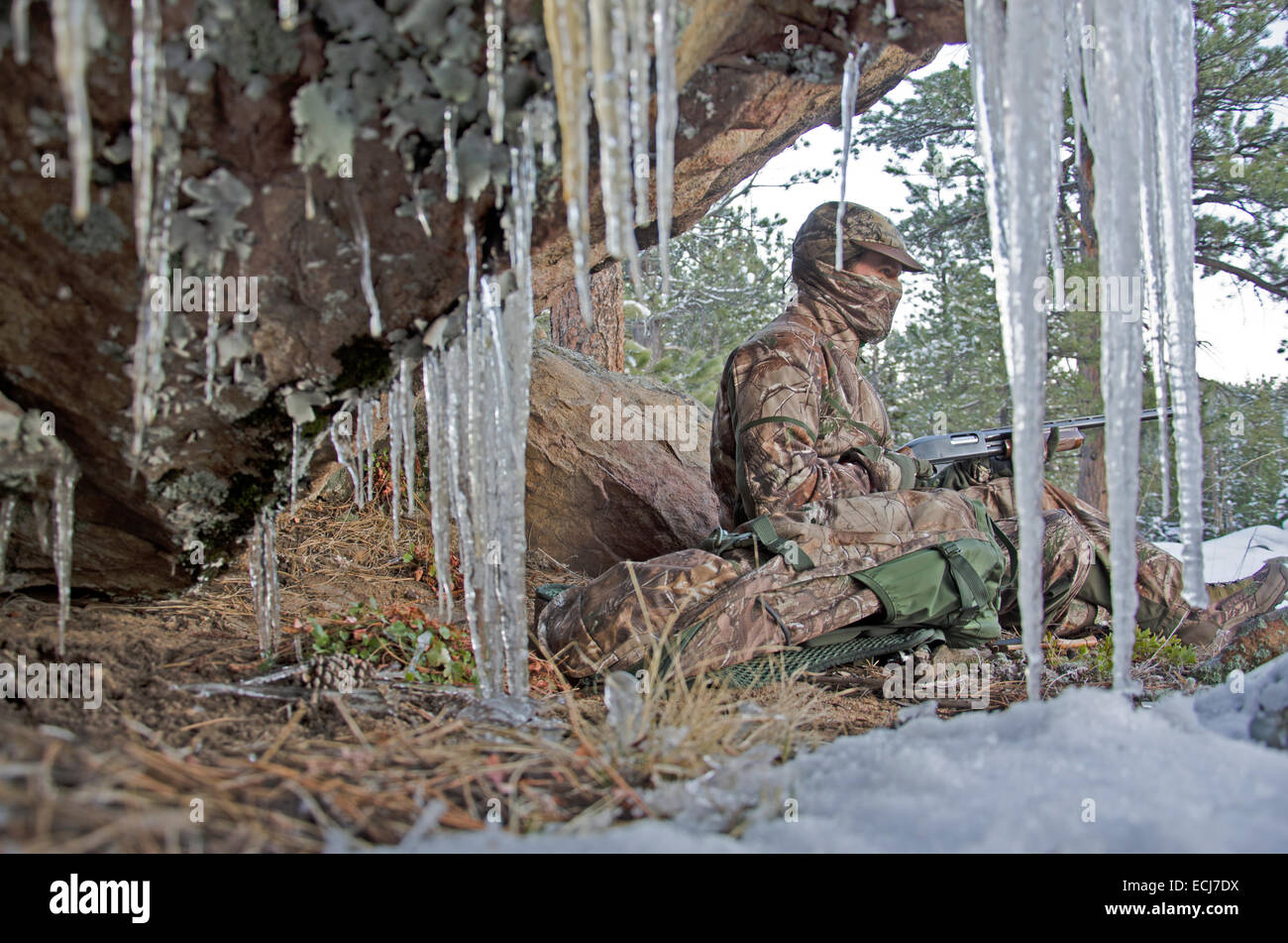 A turky hunter waits quietly on a cold morning Stock Photo - Alamy
