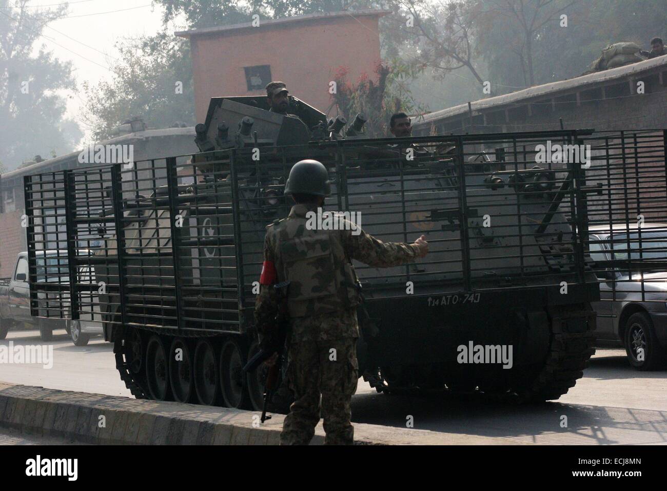 Peshawar. 16th Dec, 2014. Pakistani army soldiers take part in an ...