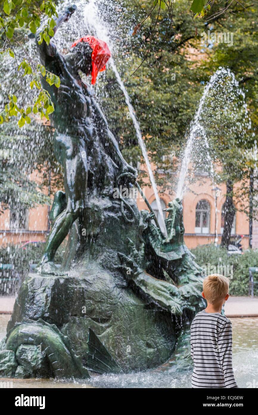 Sweden, Stockholm, Sodermalm district, Mariatorget fountain with a ...