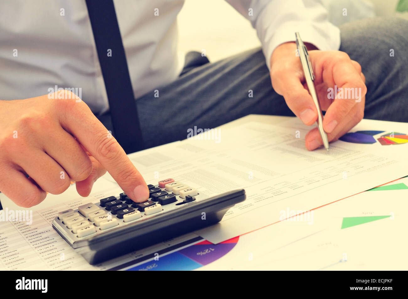 Calculating accounts hi-res stock photography and images - Alamy