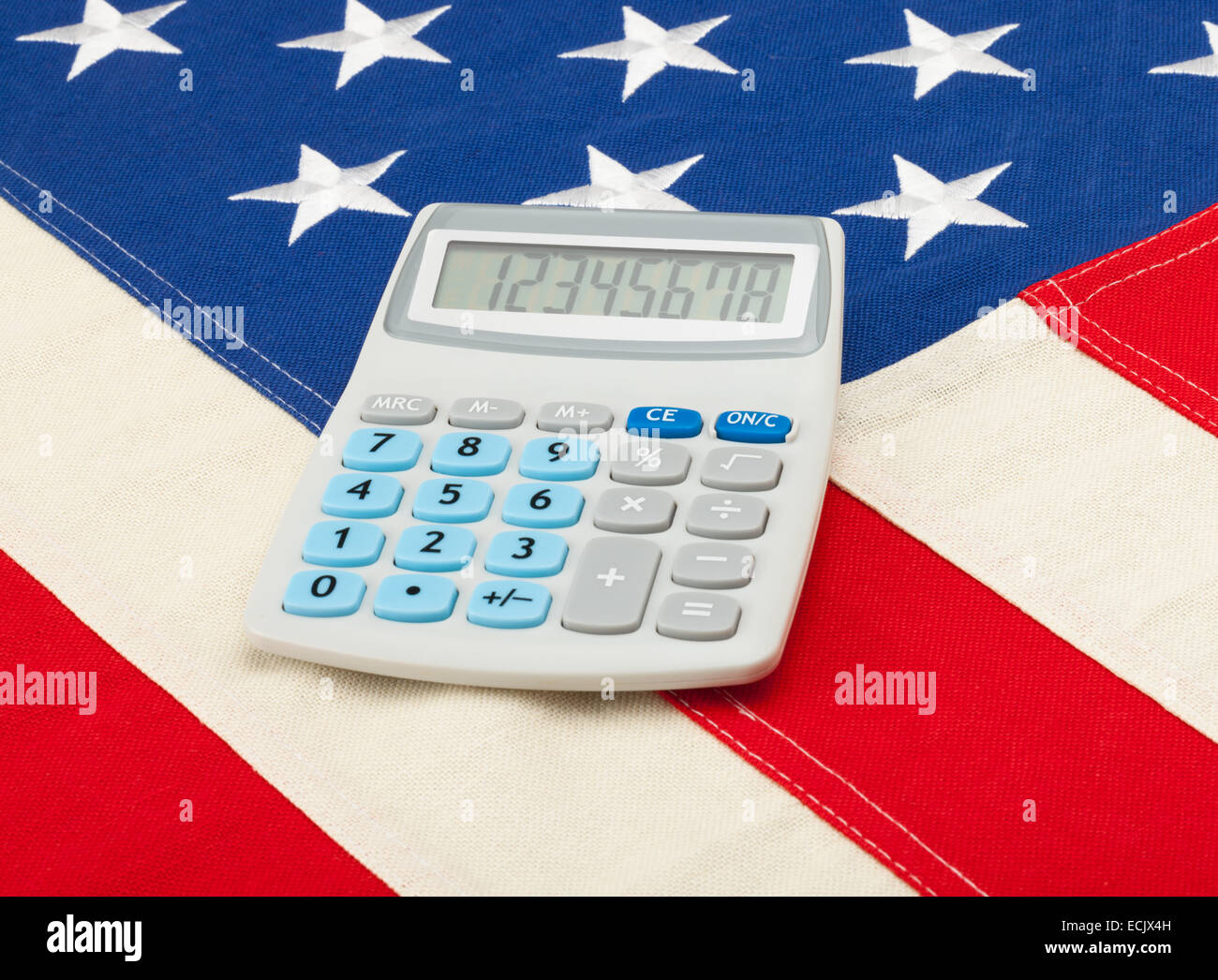 Calculator over USA flag - accounting concept Stock Photo - Alamy