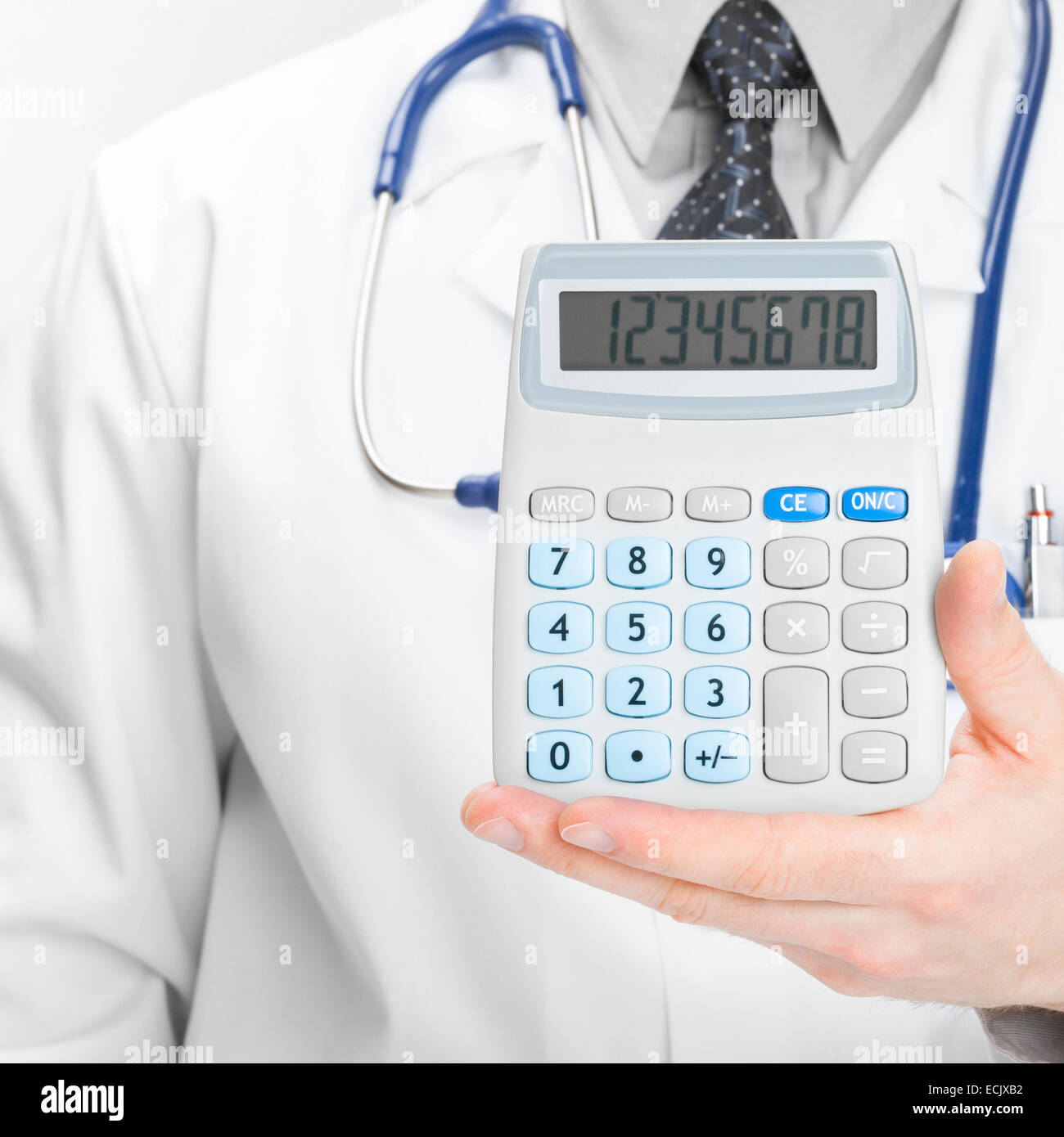 Medical doctor with calculator in his hand - medical aid concept Stock ...