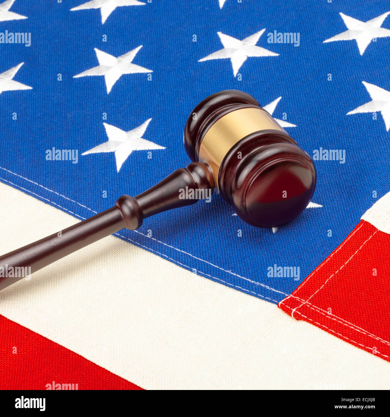 Wooden judge gavel over US flag - court judgment concept Stock Photo ...