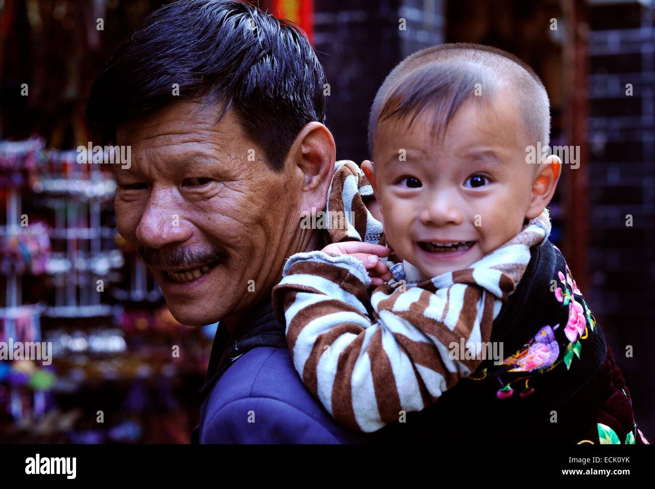 China, Yunnan Province, Jianshui, father and son Stock Photo - Alamy