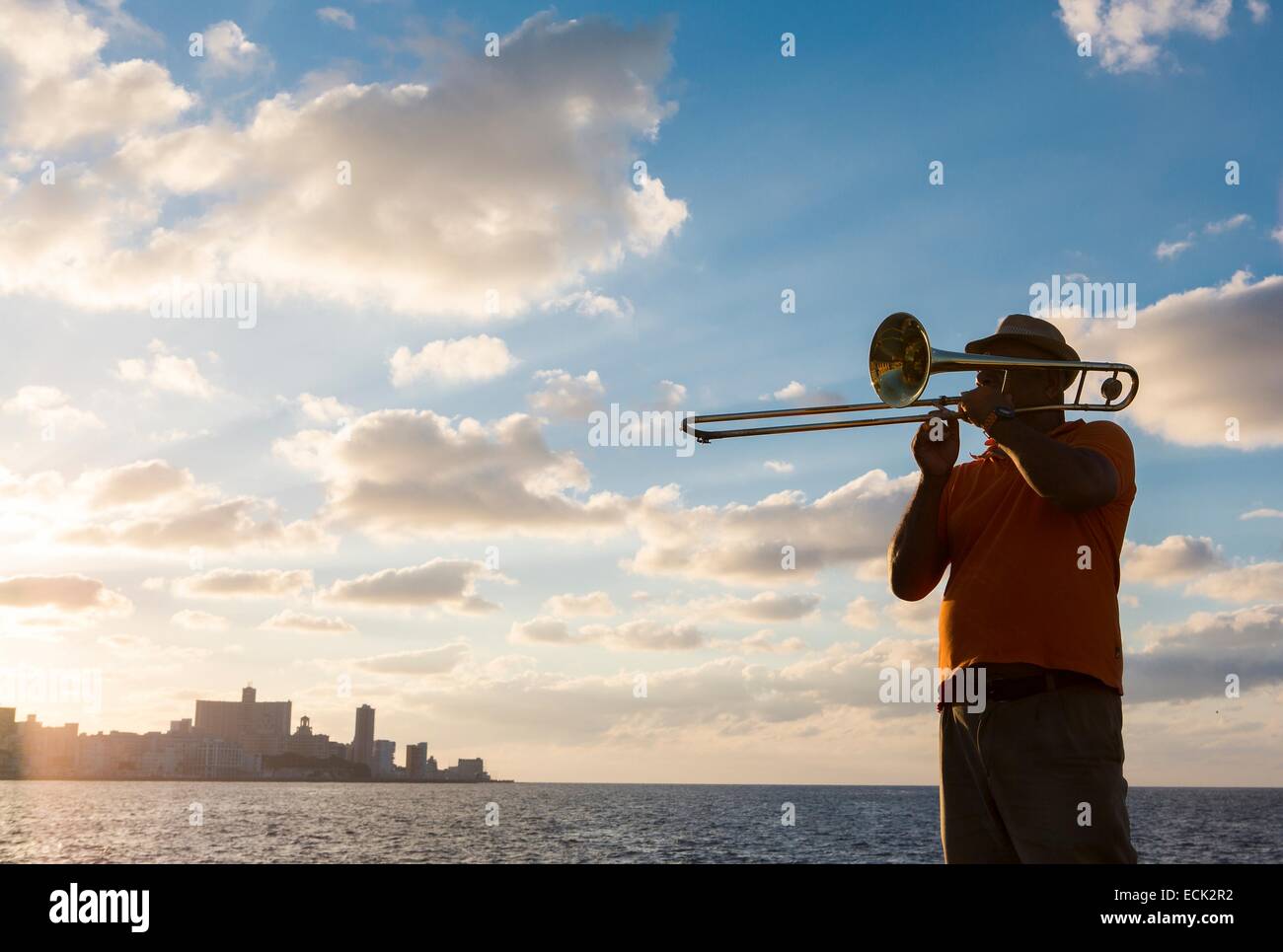 Cuba, La Habana, slide trombone player on the Malecon and Vedado ...