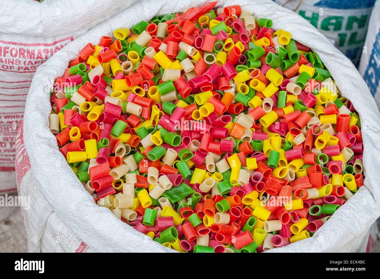 India, New Delhi, Saket district, Saket Market, multicolored pasta ...